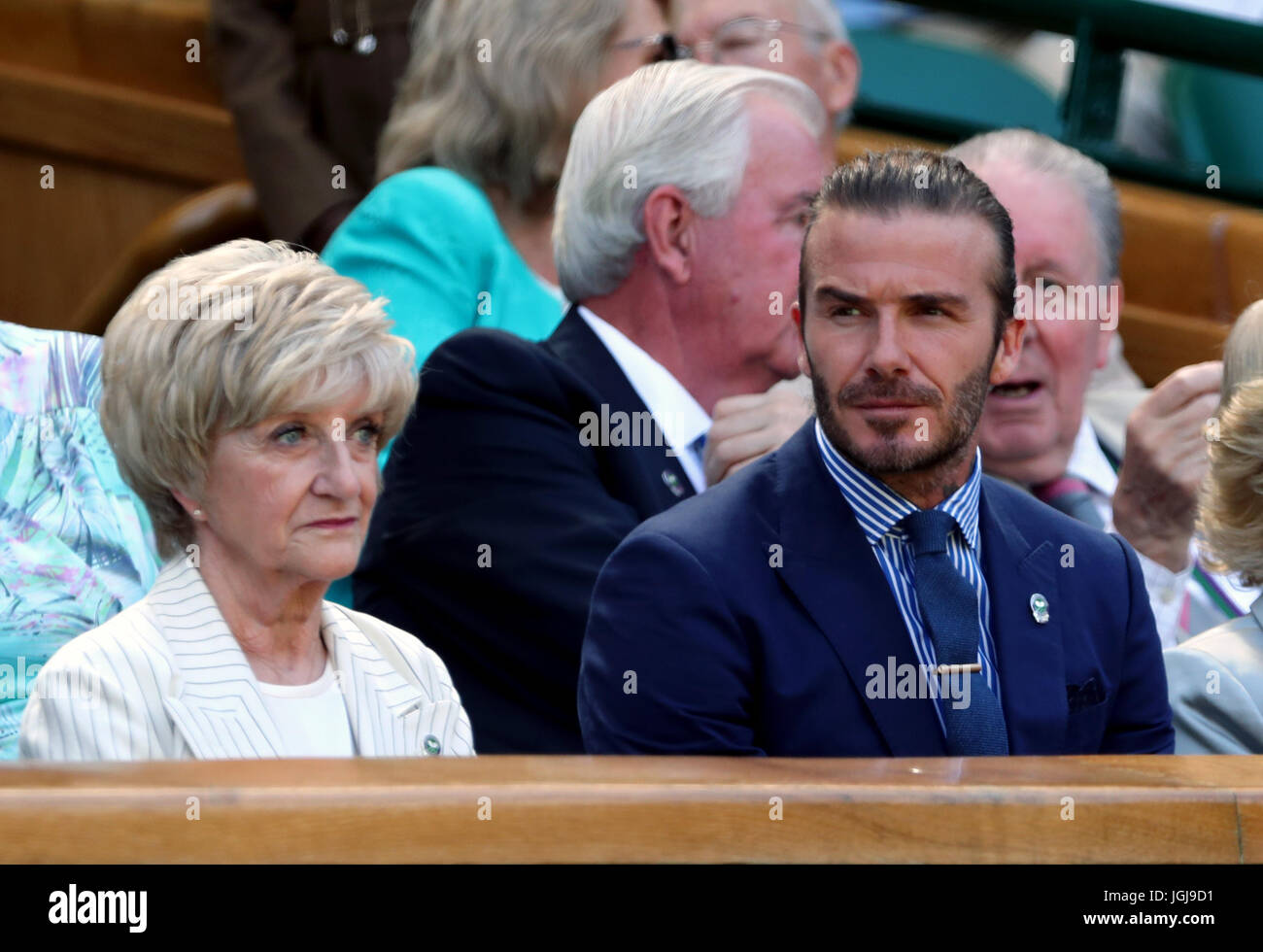 David and mum Sandra Beckham in the royal box of centre court on day ...