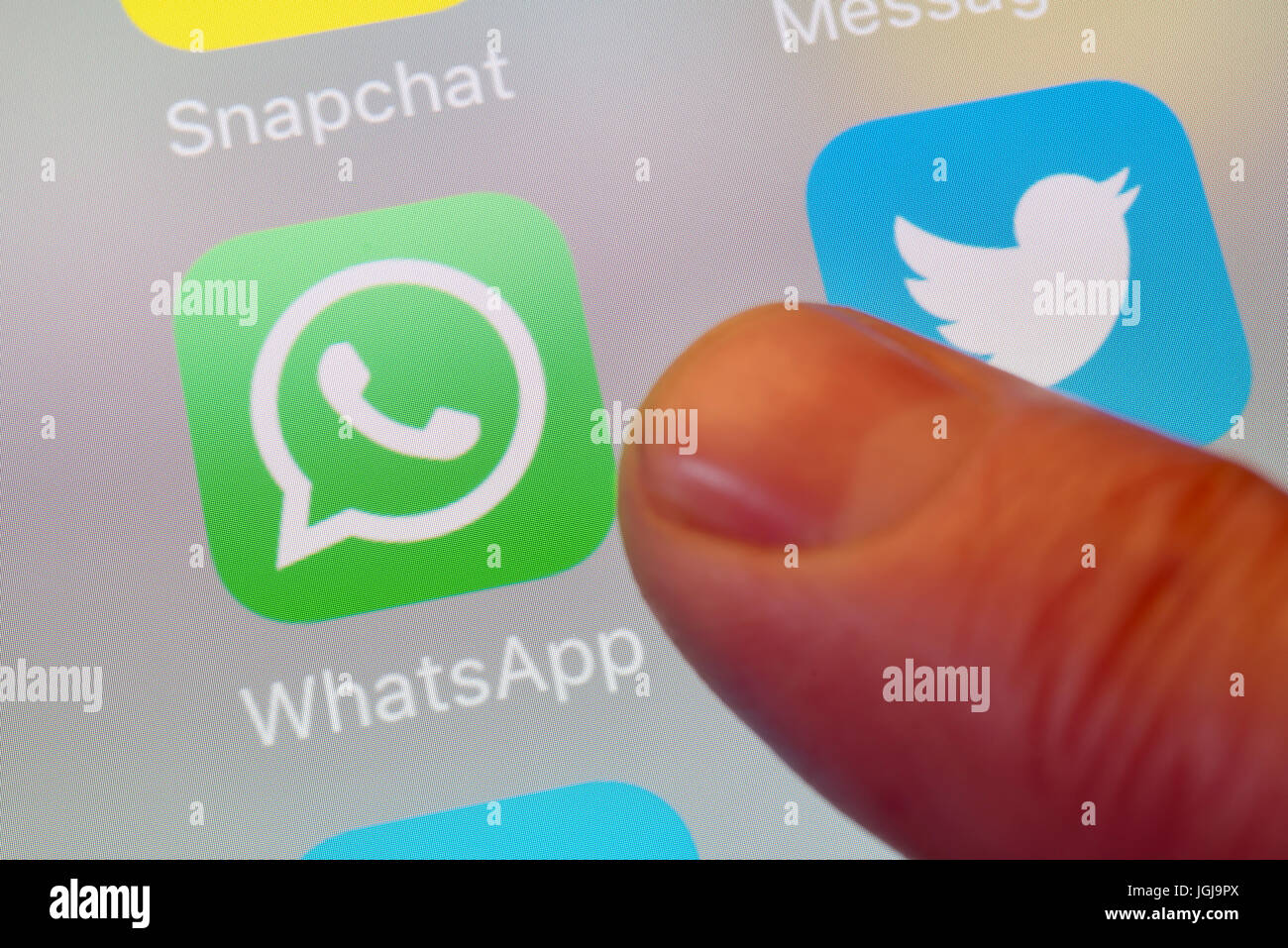 Whatsapp and Twitter apps on cellphone Stock Photo - Alamy