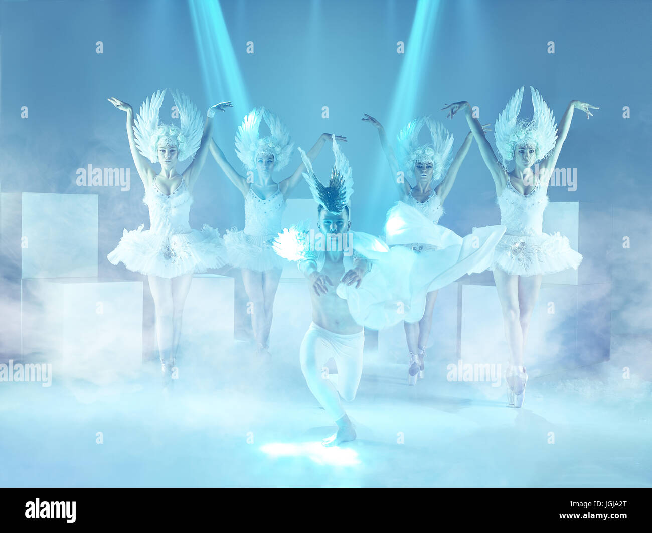 The studio shot of group of modern dancers on blue background Stock ...