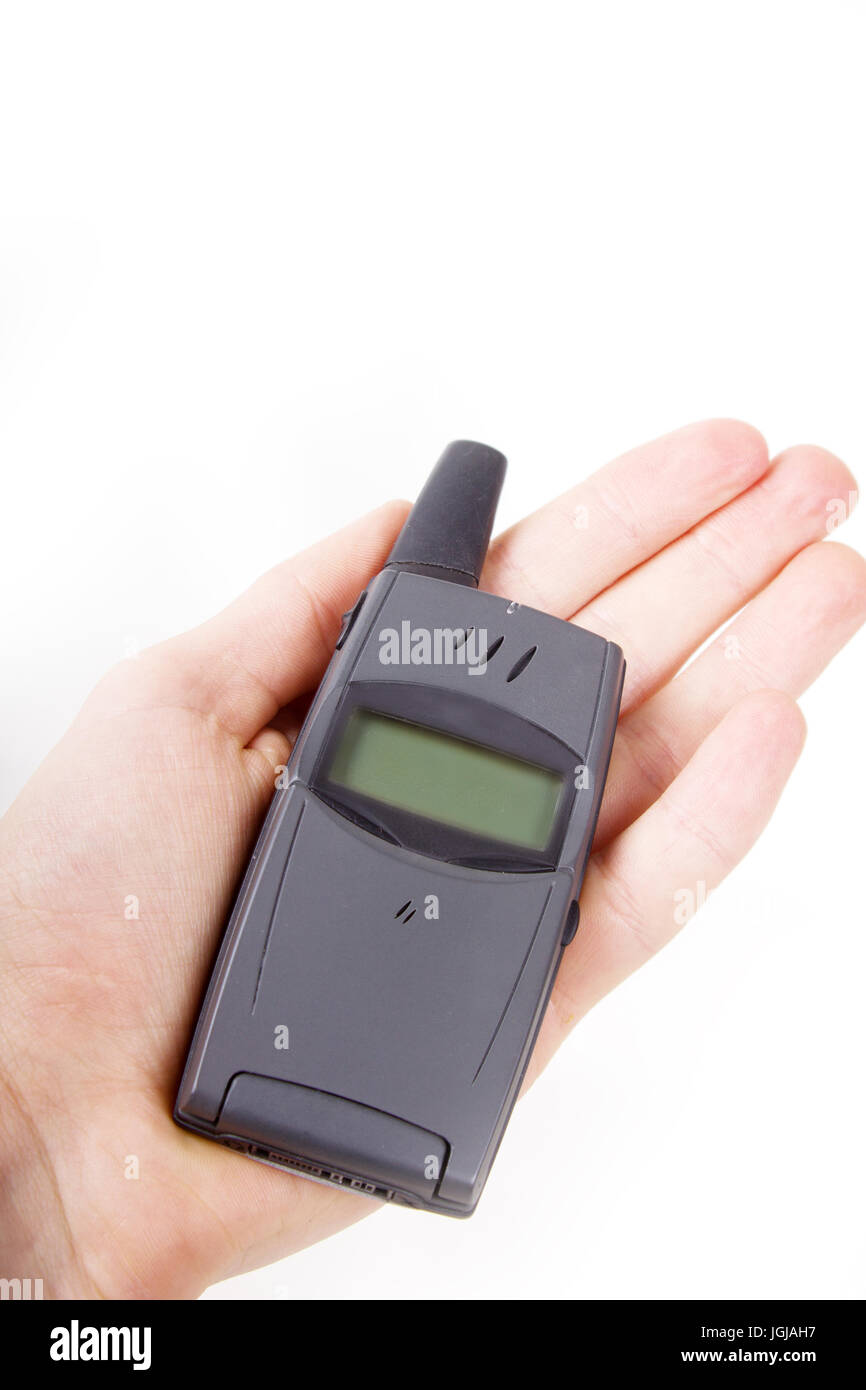 Old Mobile Phone. disposed obsolete phone on white background Stock ...