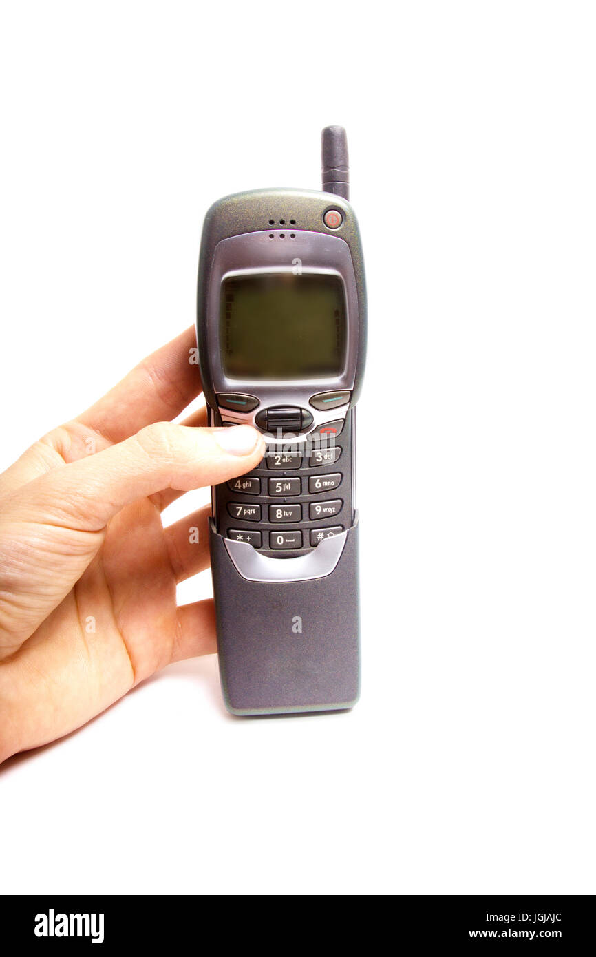 Old Mobile Phone. disposed obsolete phone on white background Stock ...