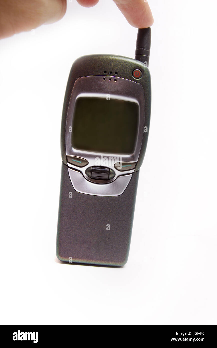 Old Mobile Phone. disposed obsolete phone on white background Stock ...