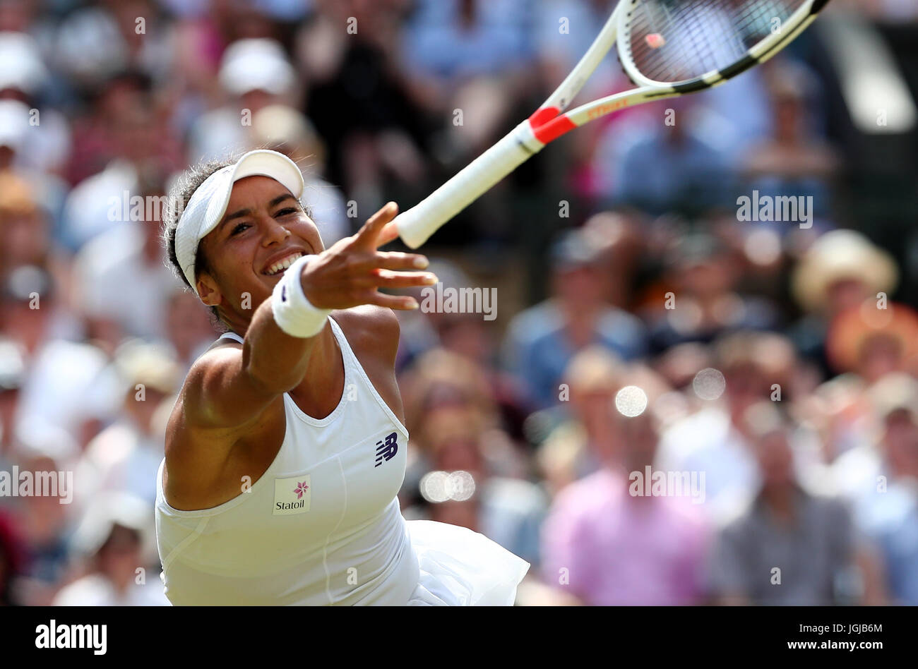 The racquet slips from Heather Watson's hand during her match against ...