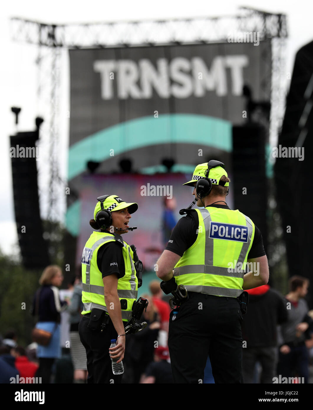 Police officers monitor the crowd attending the TRNSMT festival in ...