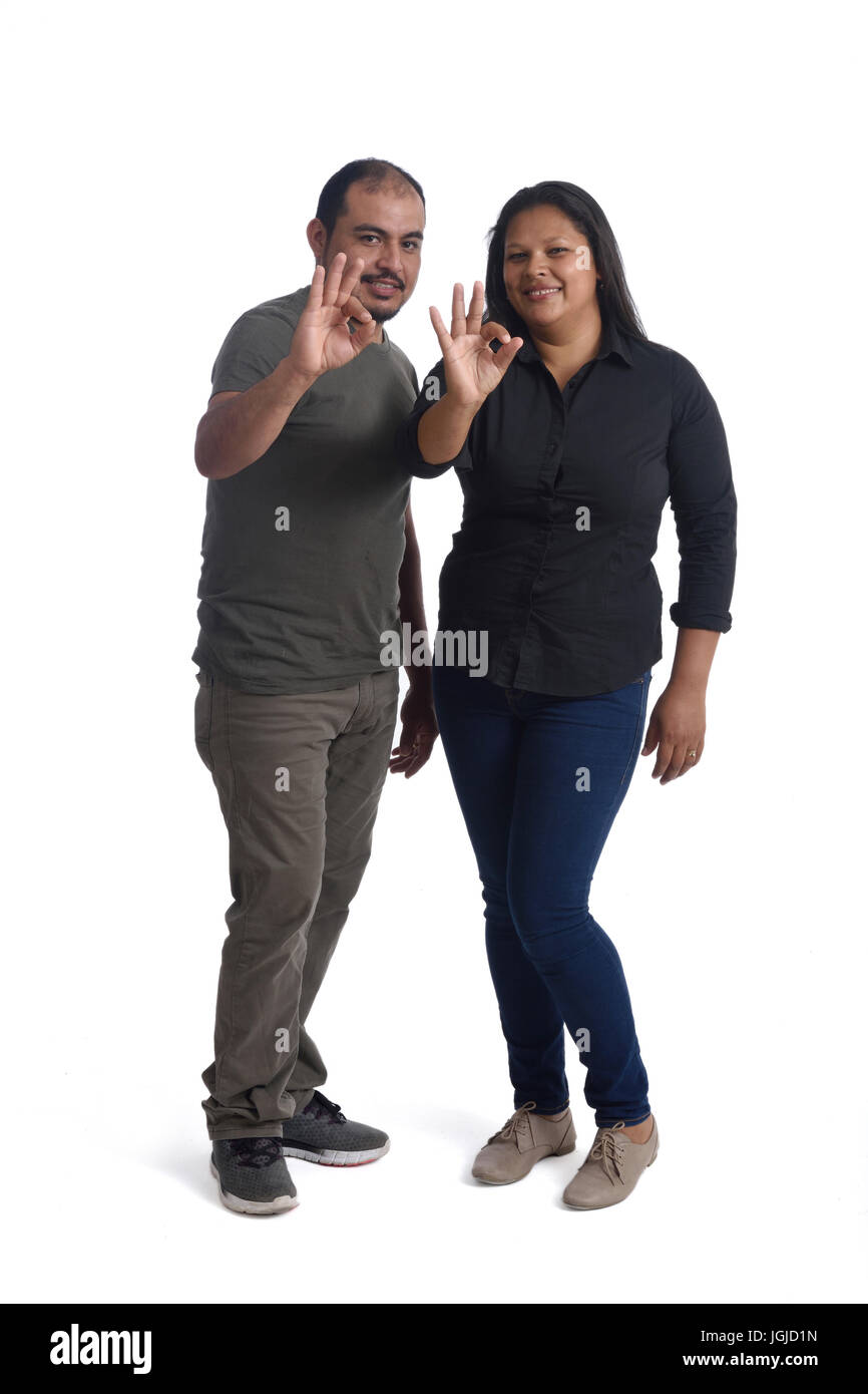 Hispanic woman hand ok sign Cut Out Stock Images & Pictures - Alamy