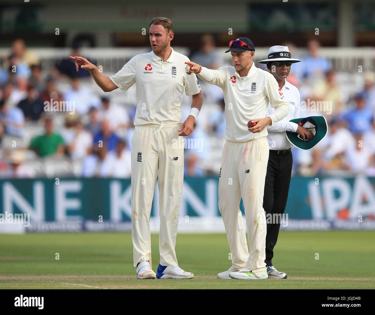 England's captain Joe Root (right) talks to Stuart Broad during day two ...