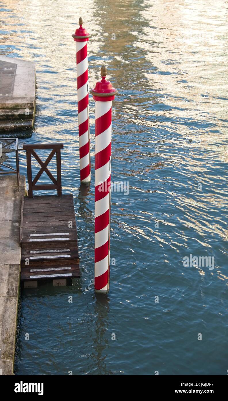 Red and white striped mooring pole hi-res stock photography and images ...