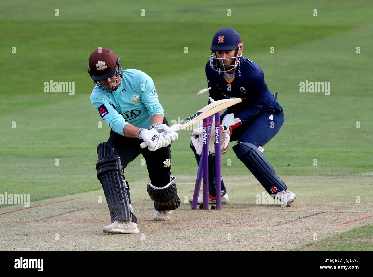 Surrey's Rory Burns is bowled out by Essex's Ashar Zaidi (not pictured ...