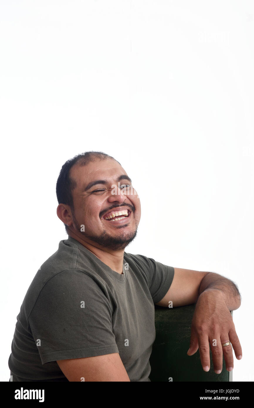 Portrait of a latin man on white background Stock Photo - Alamy