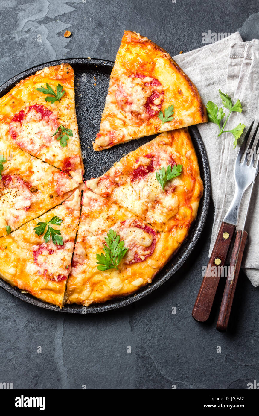 Salami slice on black slate hi-res stock photography and images - Alamy