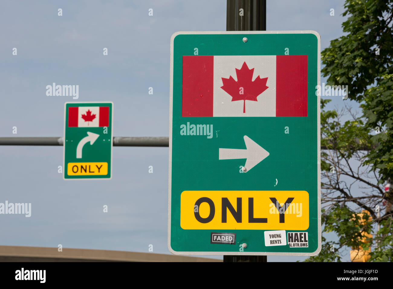 Detroit, Michigan - Signs point to the entrance of the Detroit-Windsor ...