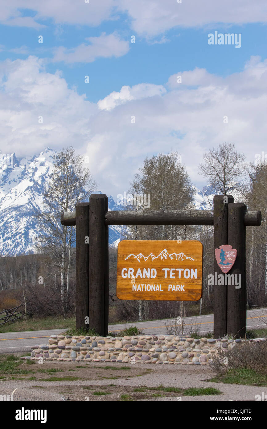 Grand Teton National Park sign with mountains in background east of ...