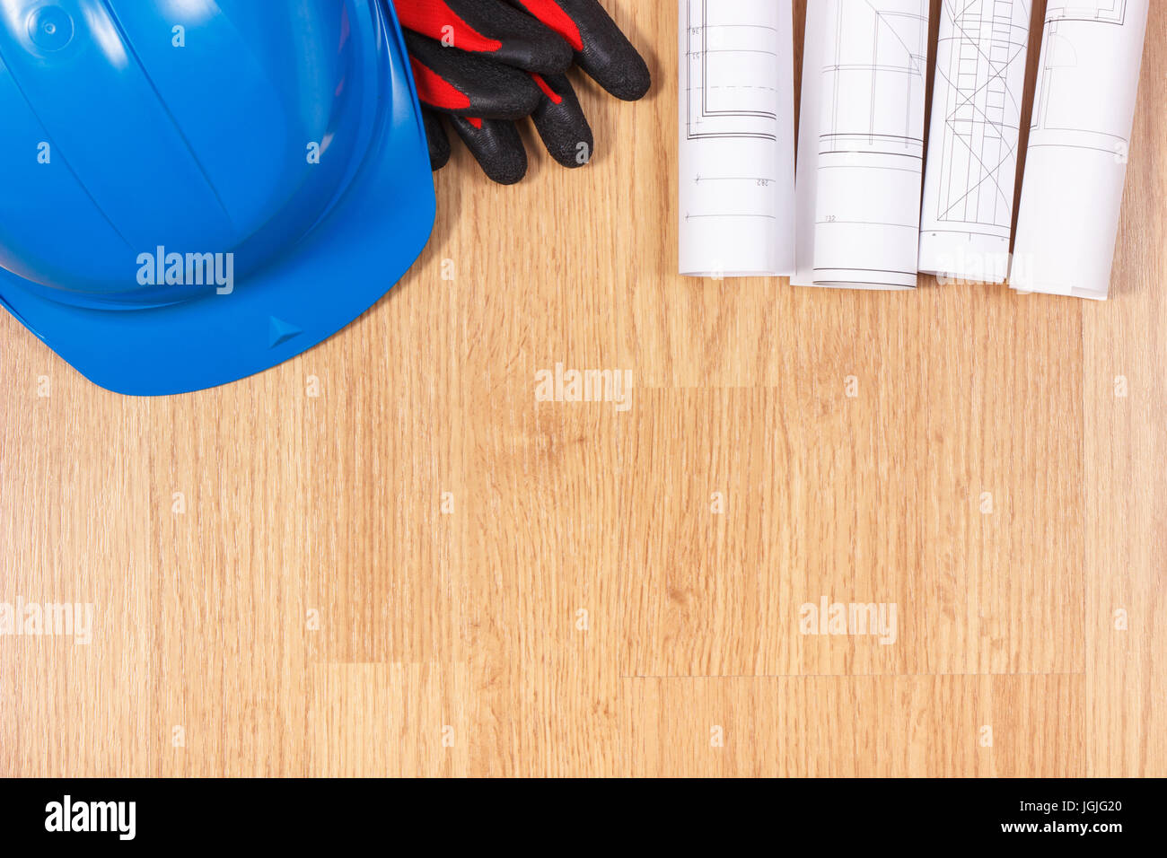 Rolls of diagrams and electrical construction drawings, protective blue ...
