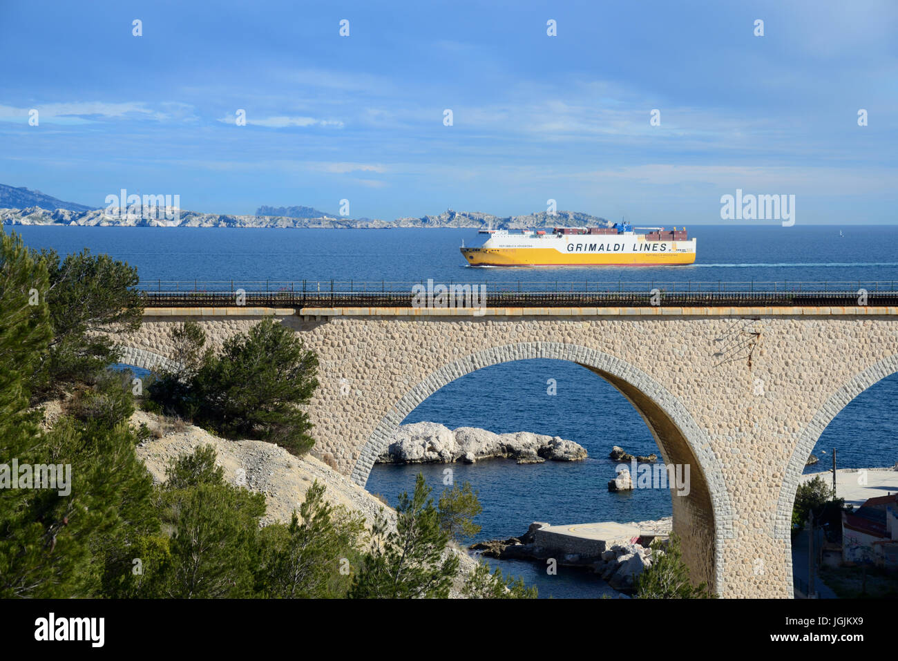 A Ferry Boat Sails Past the Railway Viaduct at La Vesse Calanque on the ...