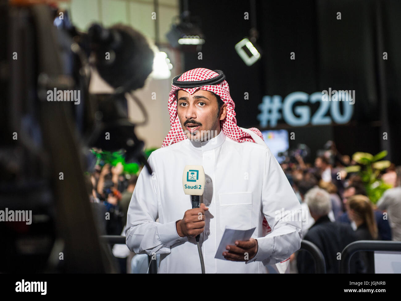 Hamburg, Germany. 7th July, 2017. A Saudi TV host speaks in front of a ...