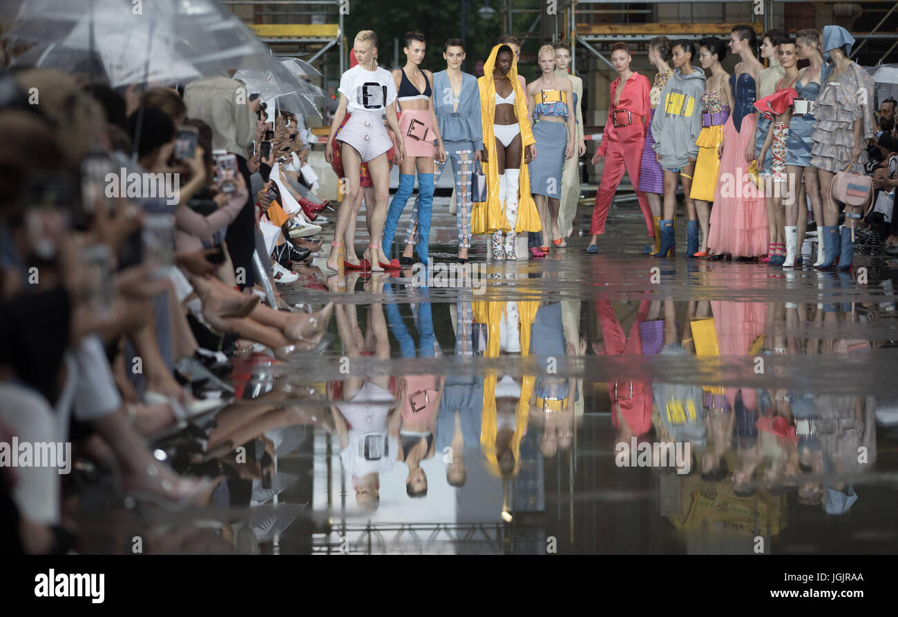 Berlin, Germany. 7th July, 2017. Models present clothes during the ...