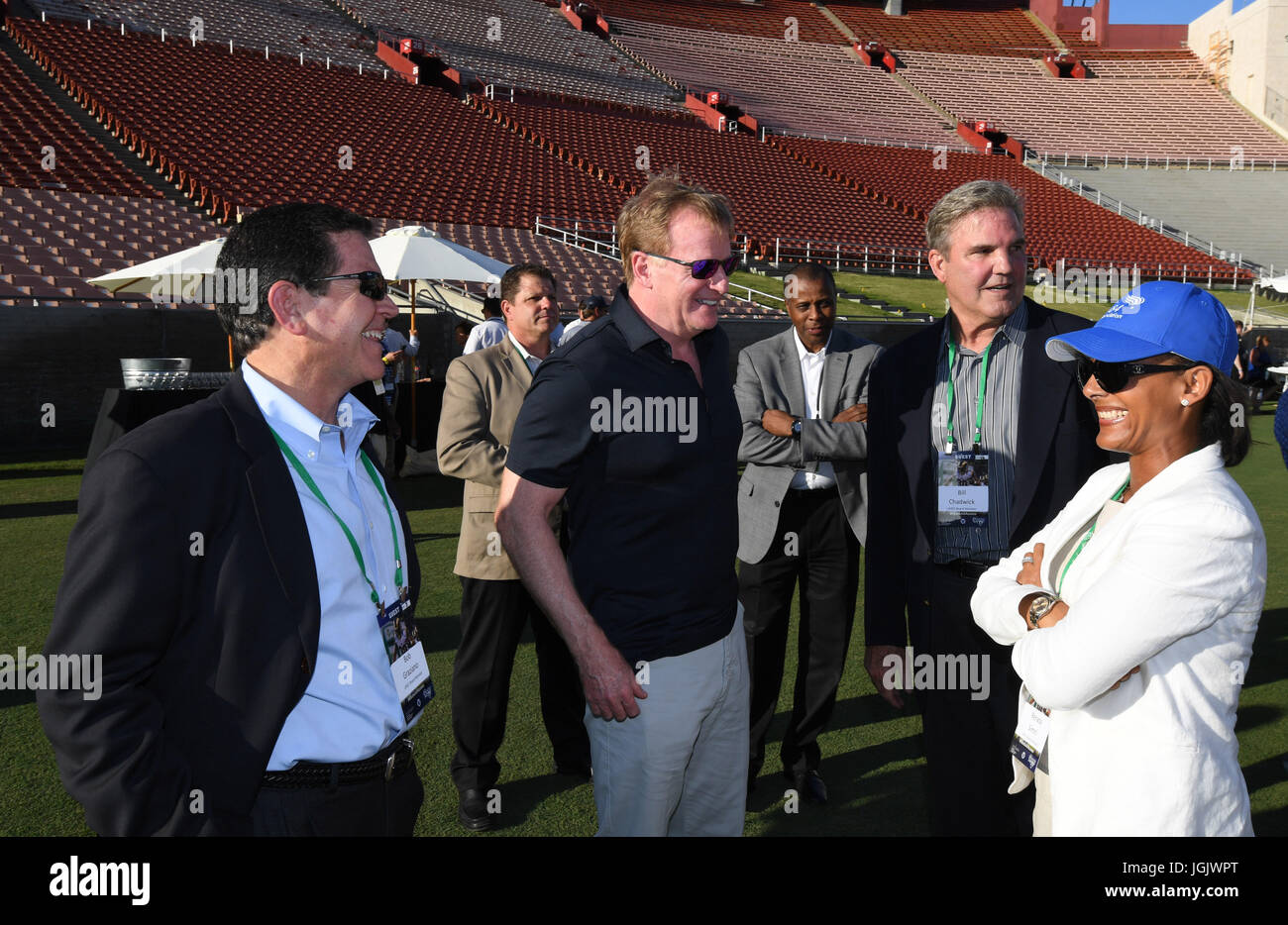 NFL commissioner Roger Goodell (second from left) visits with L.A ...