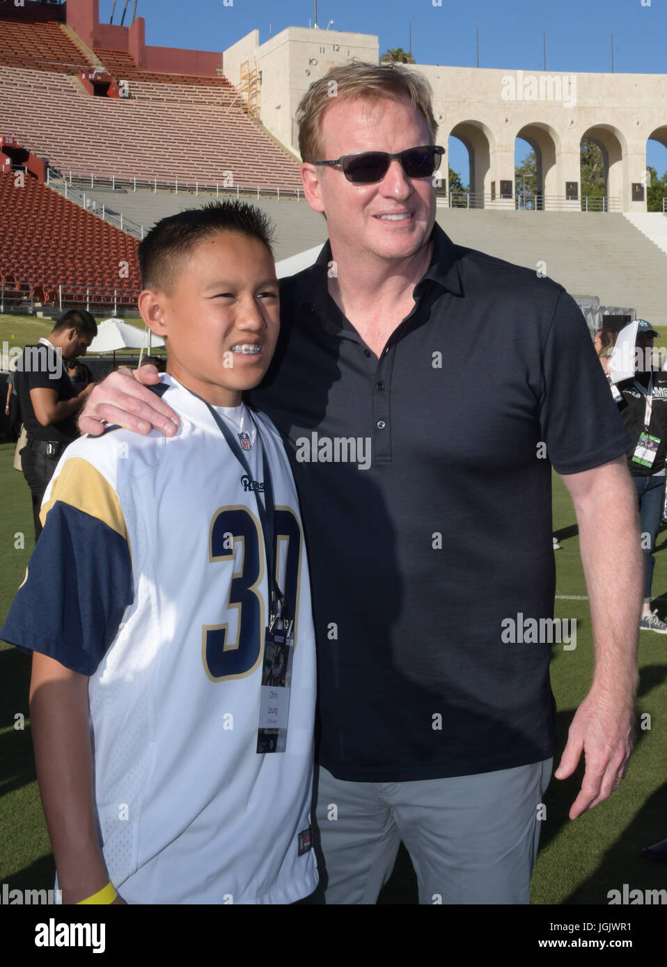 NFL commissioner Roger Goodell (right) poses with Chris Leung at Los ...