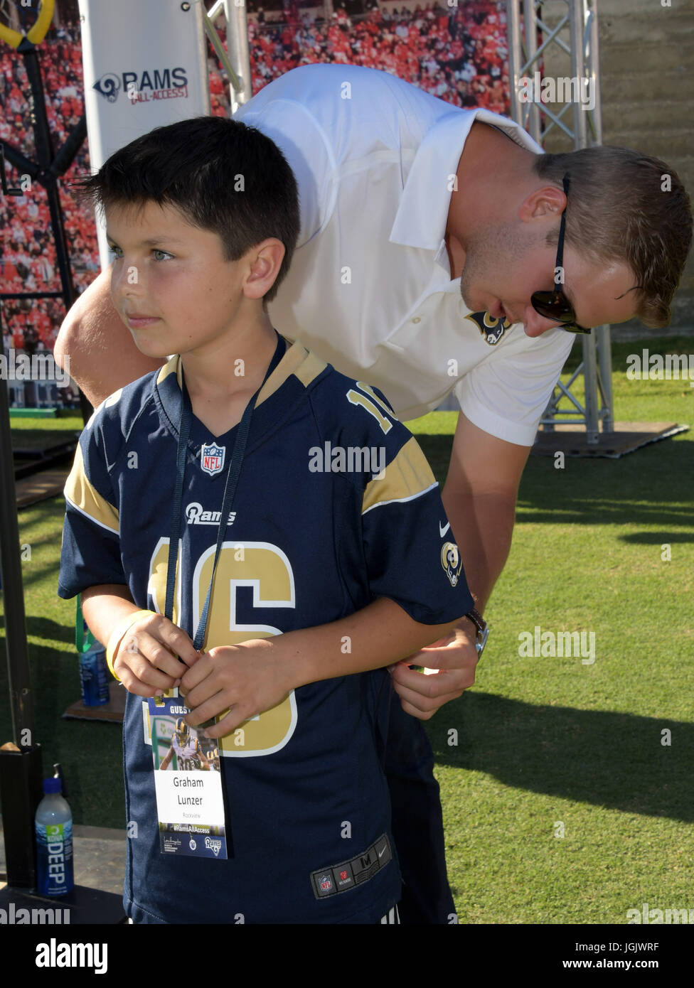 Los Angeles Rams quarterback Jared Goff signs an autograph for Graham ...