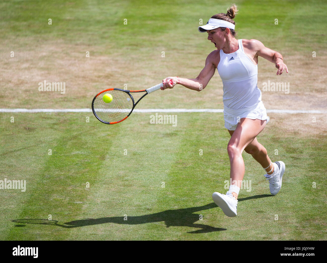 London, Britain. 7th July, 2017. Simona Halep of Romania hits a return ...