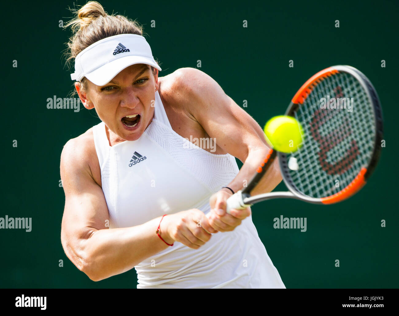 London, Britain. 7th July, 2017. Simona Halep of Romania hits a return ...