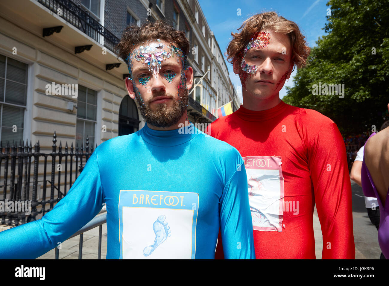 London Pride 2017 - two guys in blue and red Stock Photo - Alamy