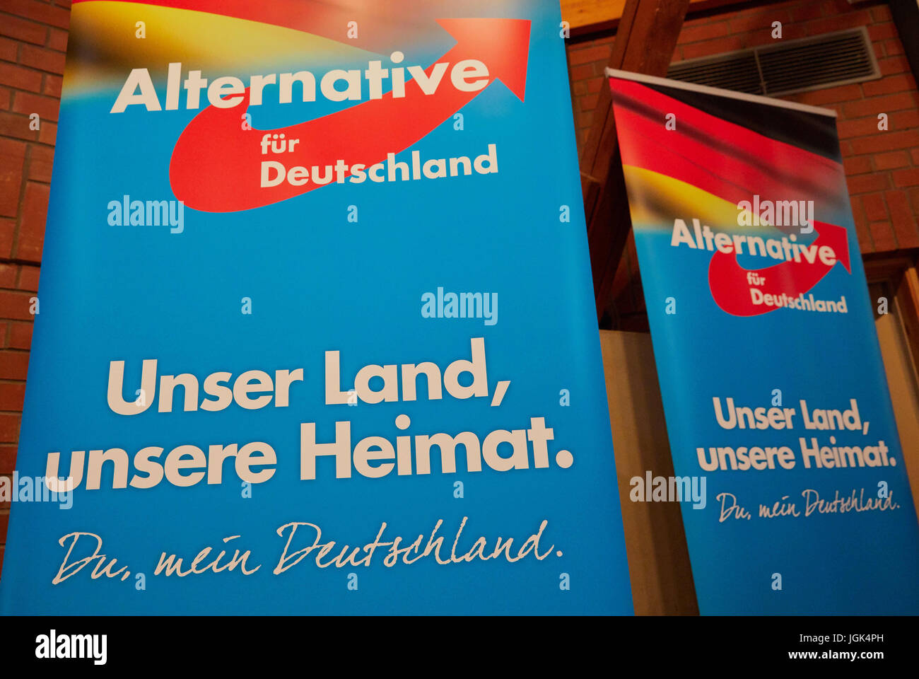 Henstedt-Ulzburg, Germany. 8th July, 2017. Two banners reading ...