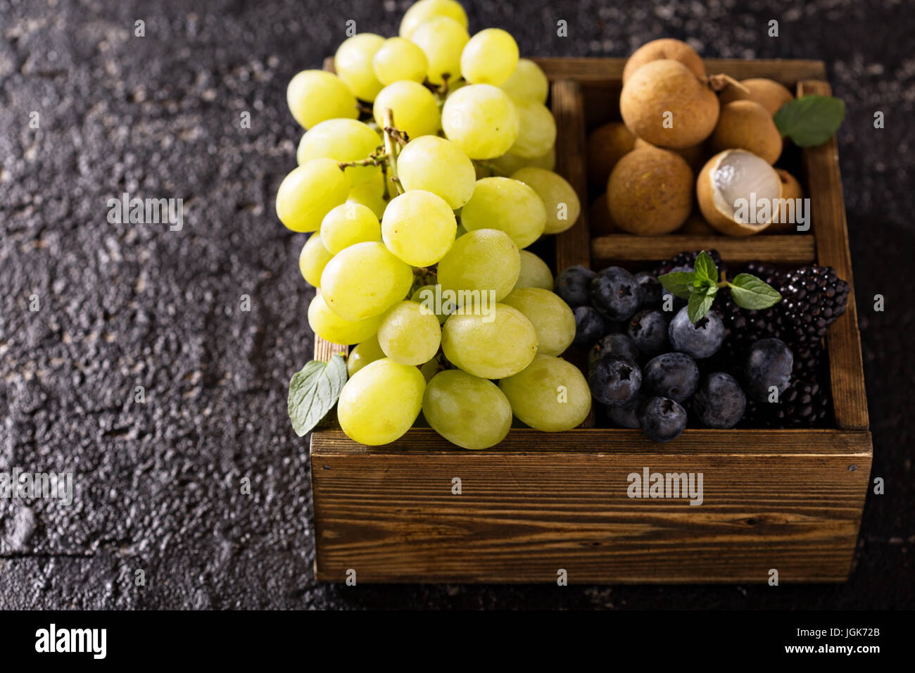 Fresh fruits in wooden box Stock Photo - Alamy