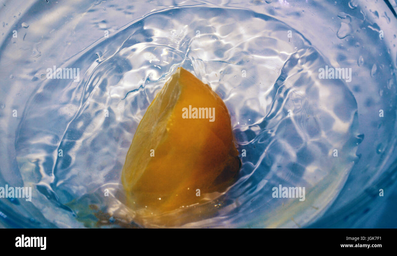 Orange lemon slices falling water hi-res stock photography and images ...
