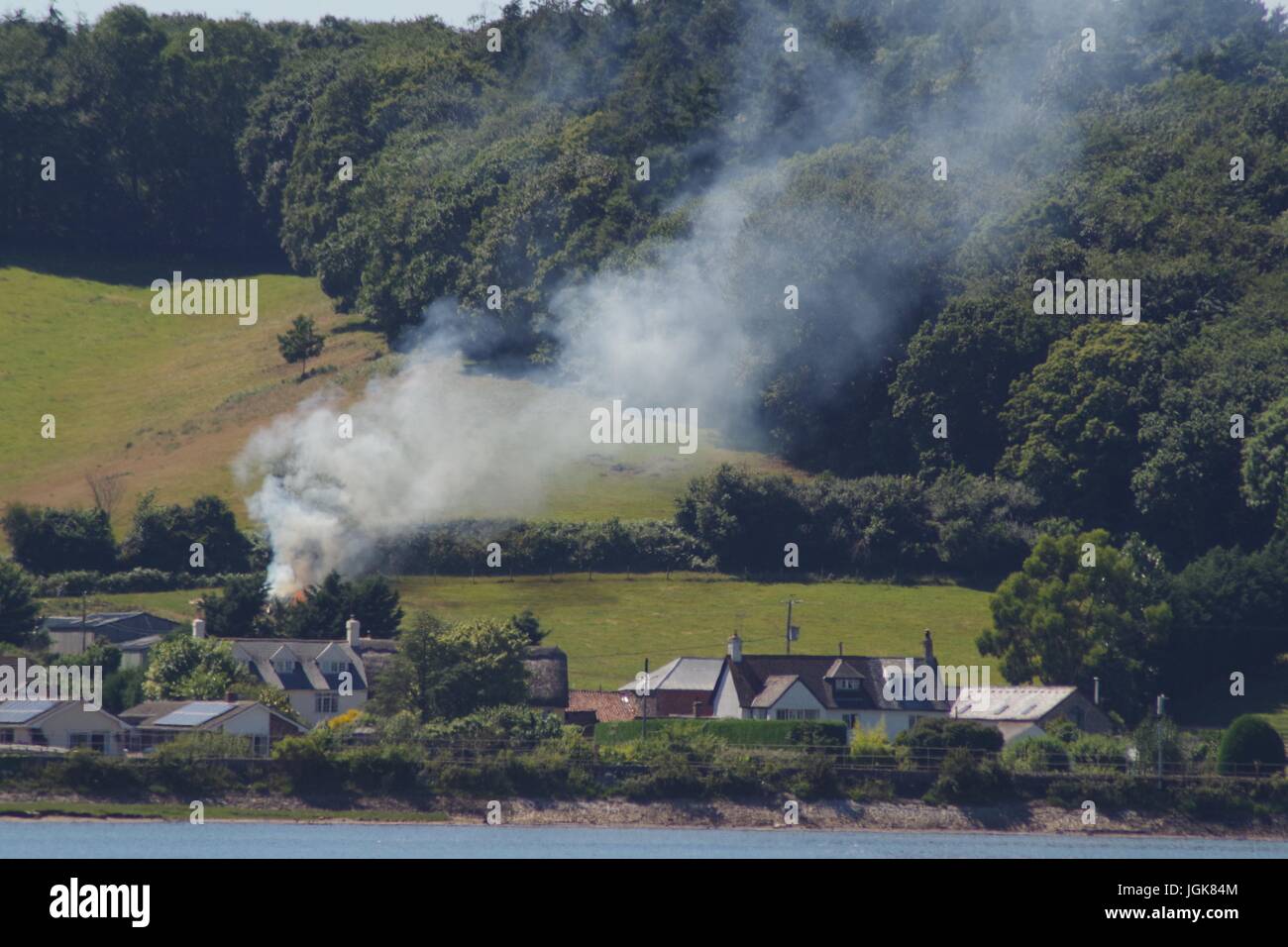 Fire Smoke Plume from the Burning of Farm Waste. Exe Estuary, Devon, UK ...