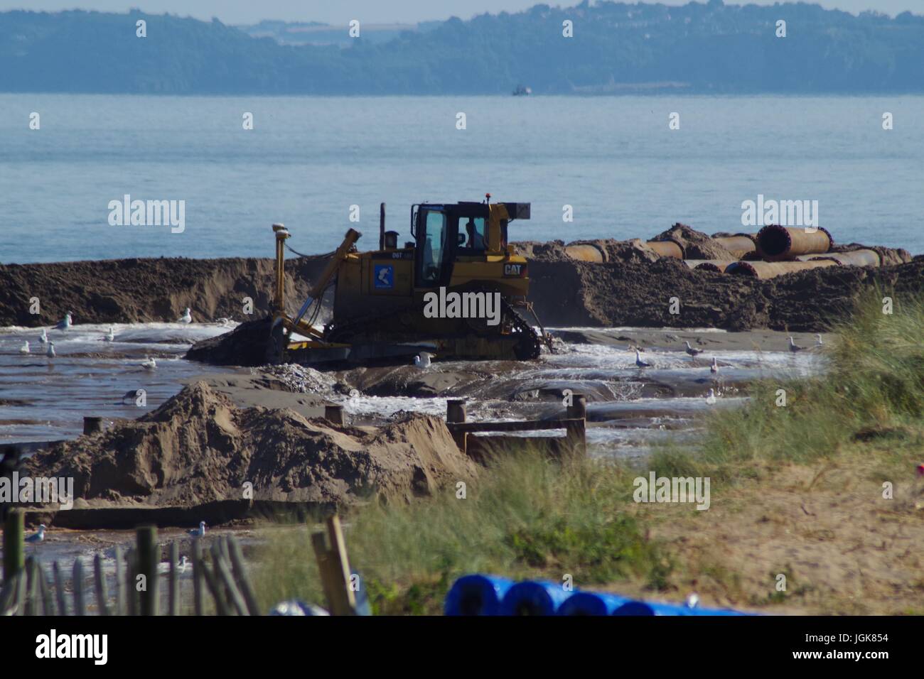 Excavators Shaping Dredged Sand to Replenishing the Beach at Dawlish ...