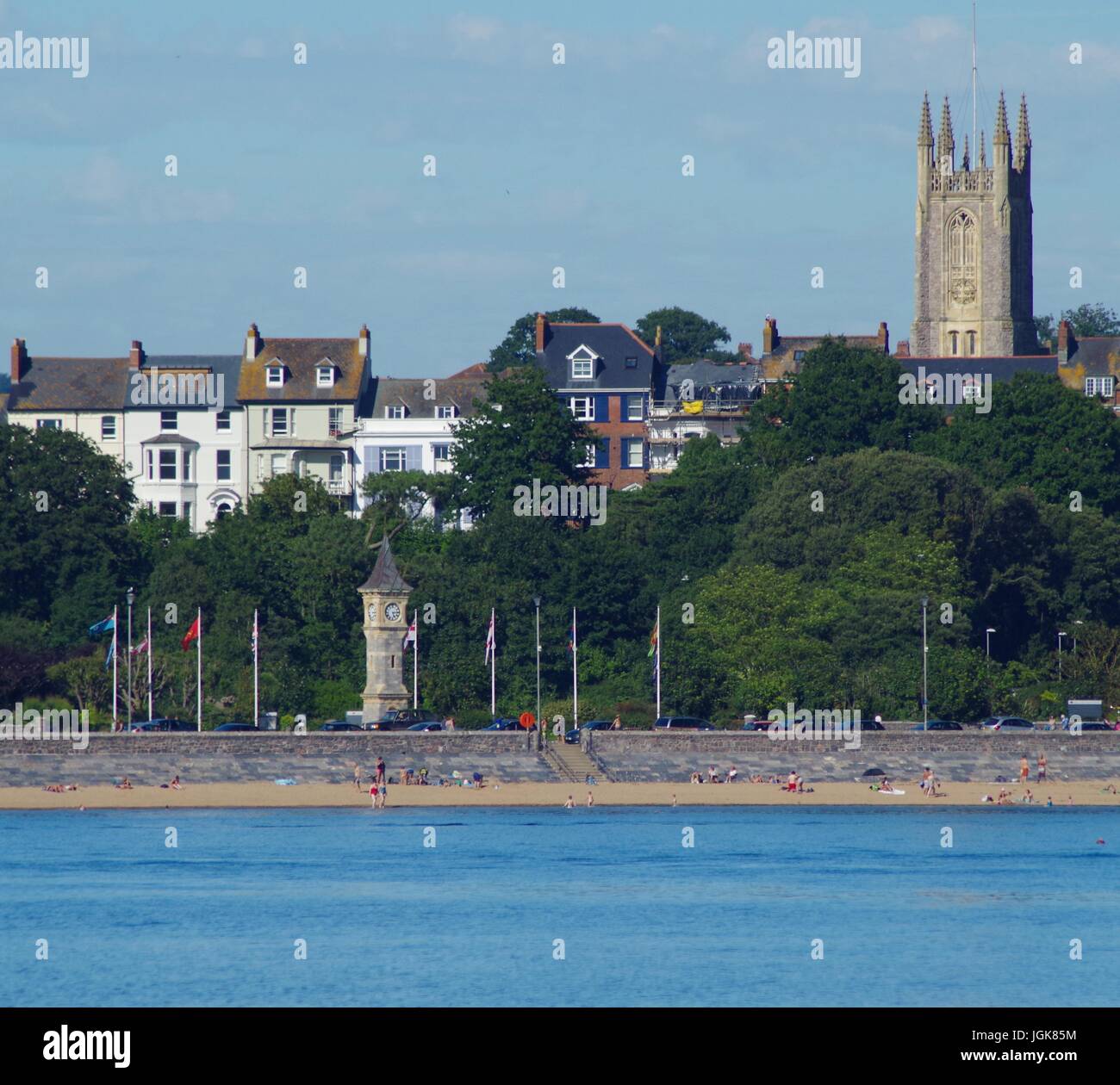 Exmouth Seafront, Jubilee Clock Tower and Holy Trinity Church on a ...