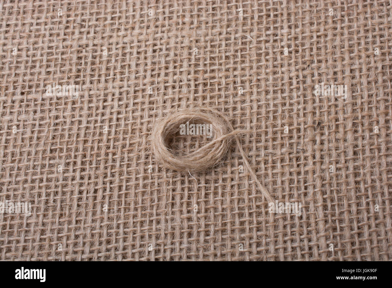 Roll of brown color linen string paper background Stock Photo - Alamy