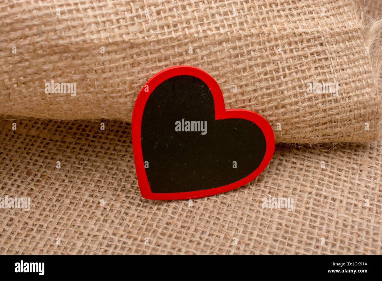 Heart shaped object placed on canvas Stock Photo - Alamy