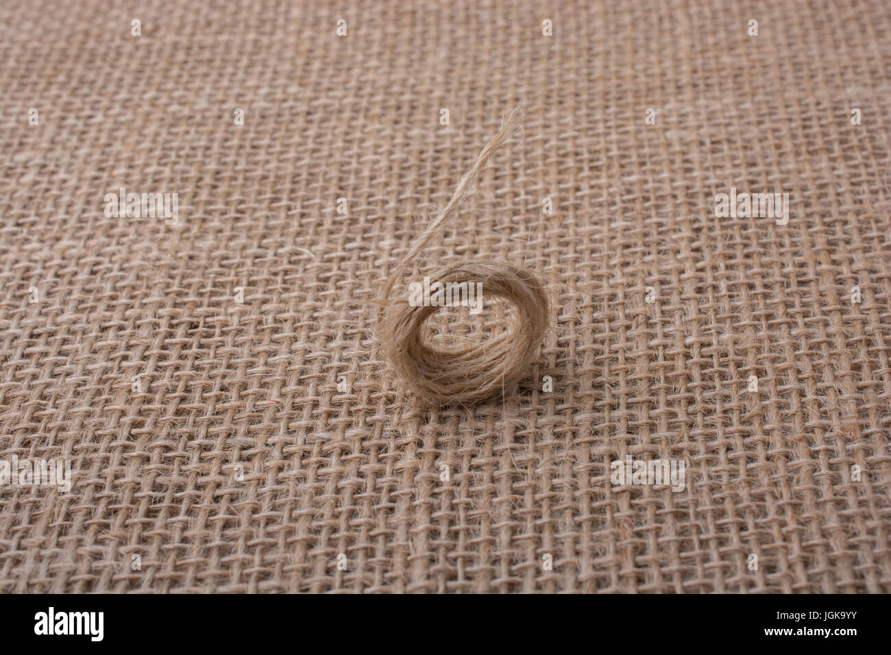 Roll of brown color linen string paper background Stock Photo - Alamy