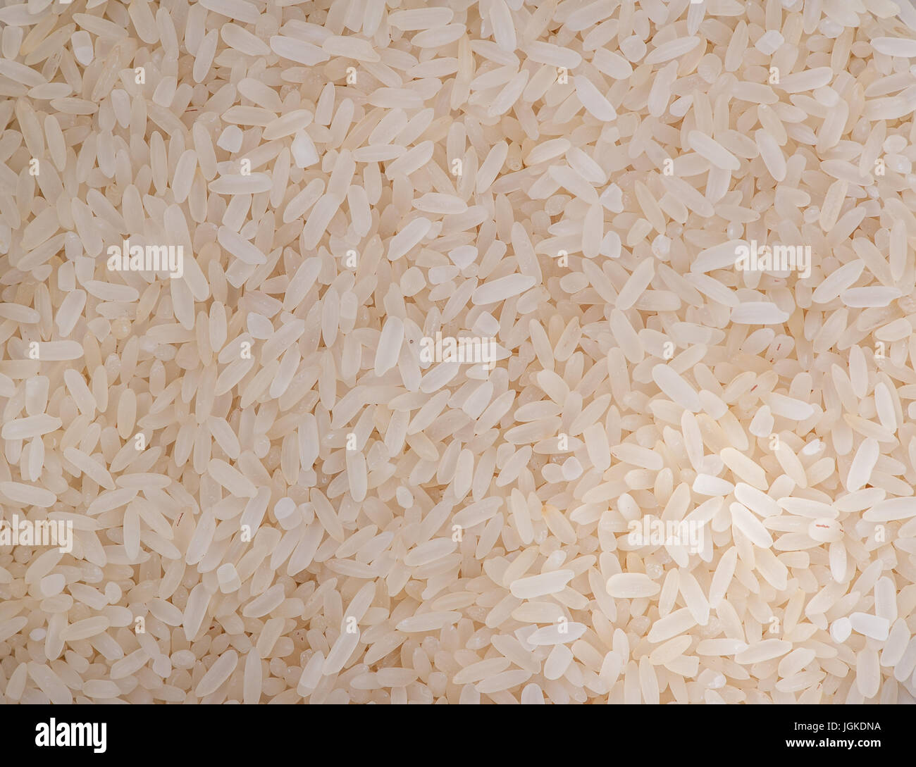 Uncooked organic brown rice texture Stock Photo - Alamy