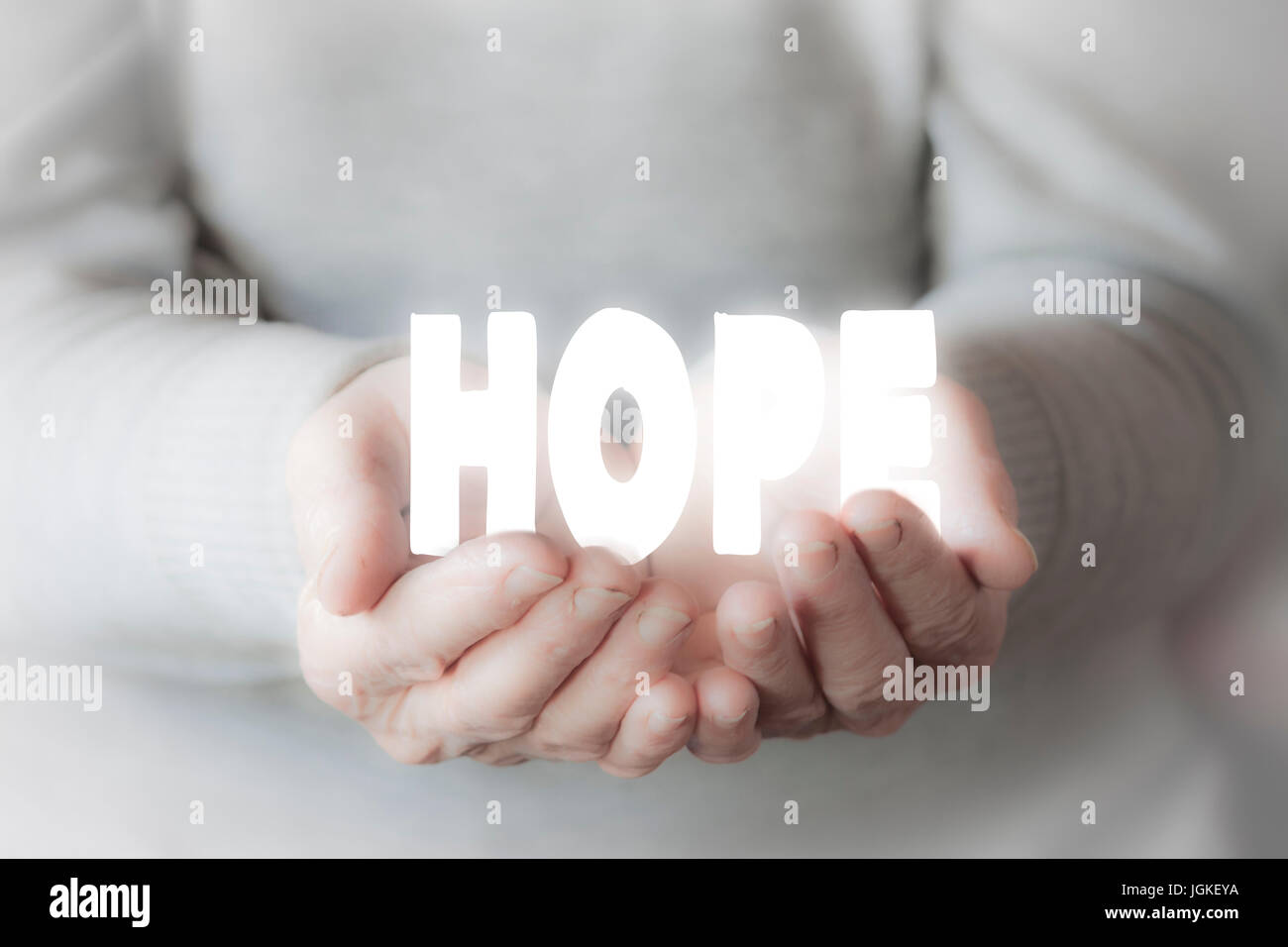 Woman's hands holding the write "HOPE Stock Photo - Alamy