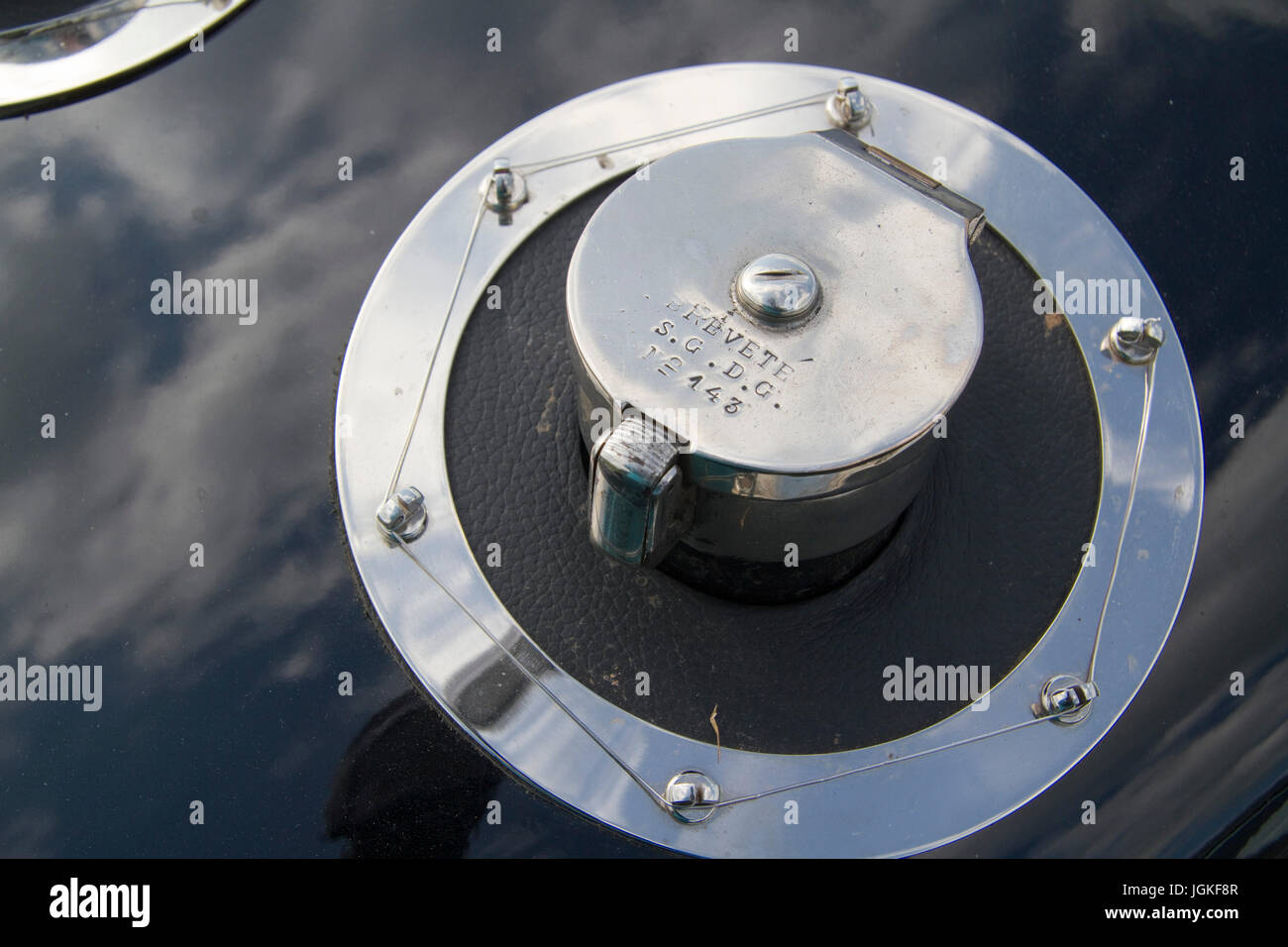 Detail of the filler cap(s) on a vintage Bugatti Stock Photo - Alamy