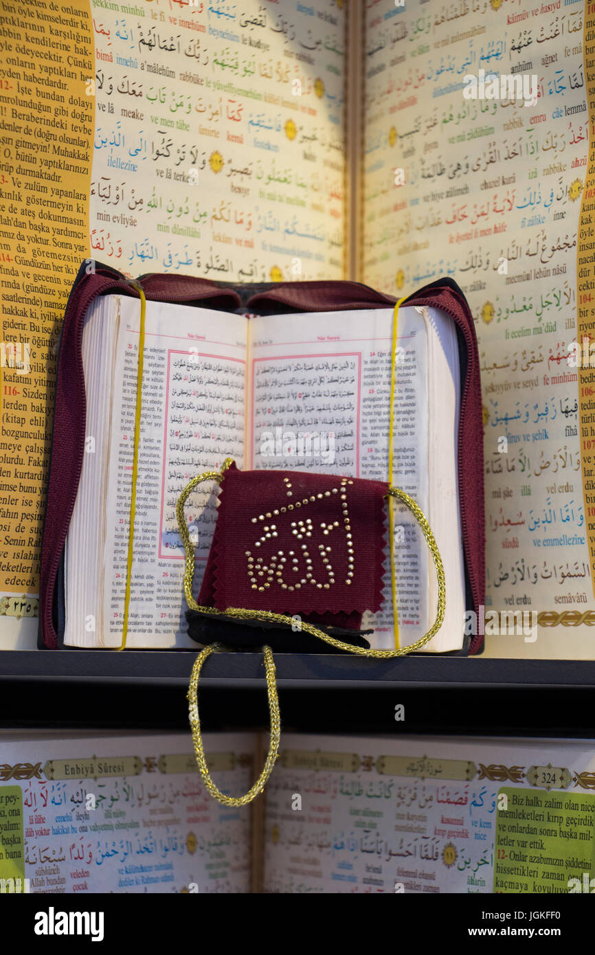Islamic Holy Book Quran on the market shelf Stock Photo - Alamy