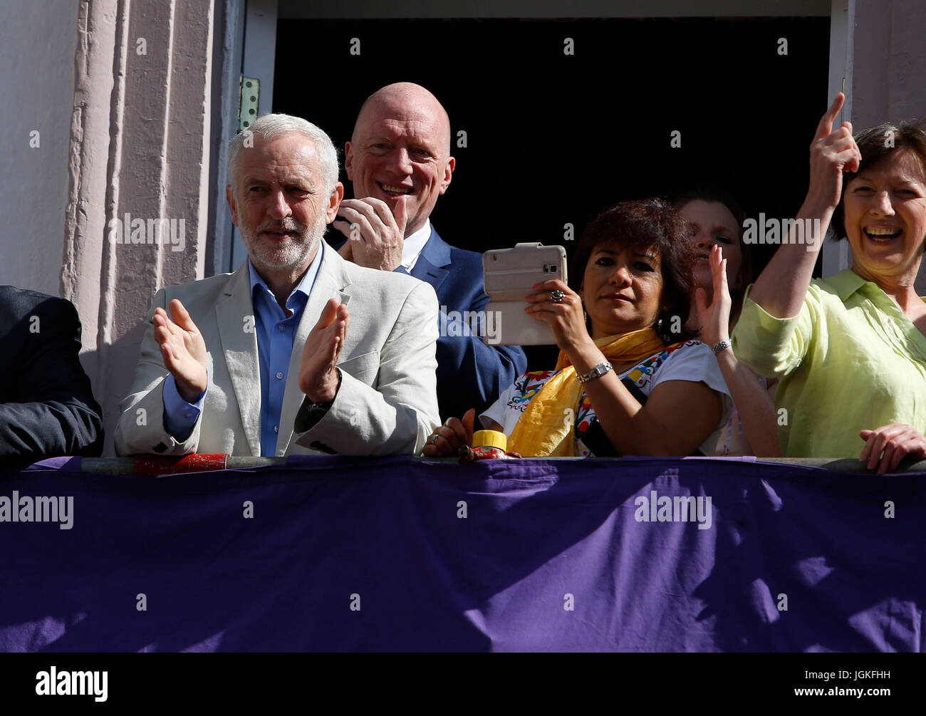 Labour leader Jeremy Corbyn (left) and his wife Laura Alvarez (centre ...