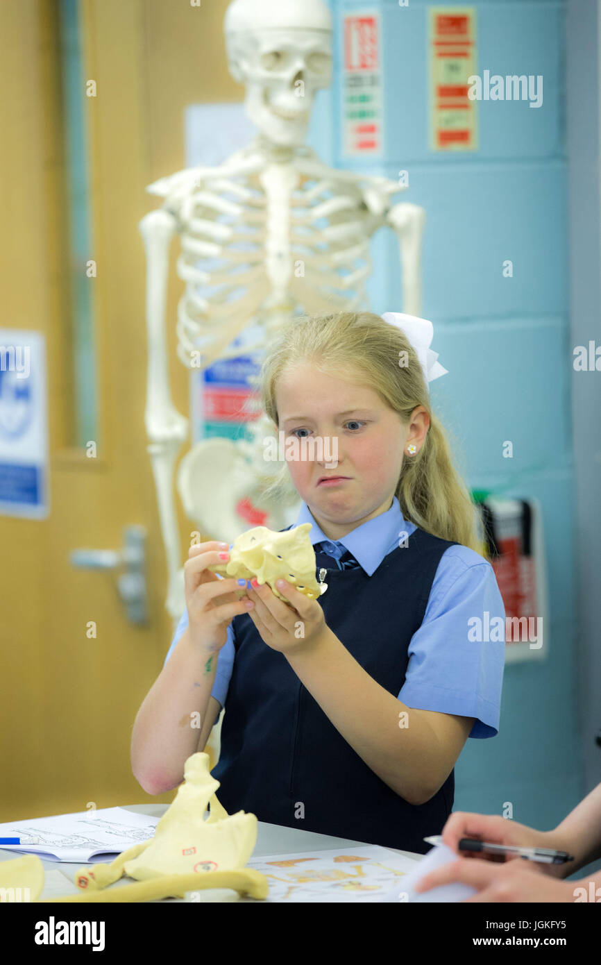girl jumping off wall Stock Photo - Alamy