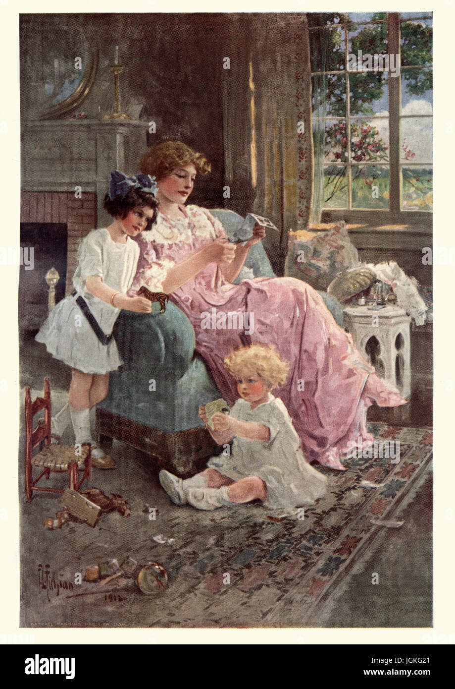 Edwardian mother and her children at playtime, 1912 Stock Photo - Alamy