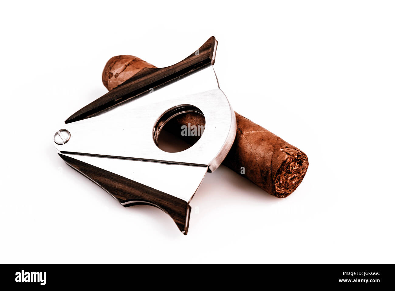 Expensive cigar and cutter on a white background Stock Photo - Alamy