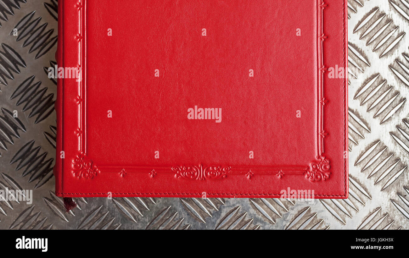 Closeup view of red leather book of impressions Stock Photo - Alamy