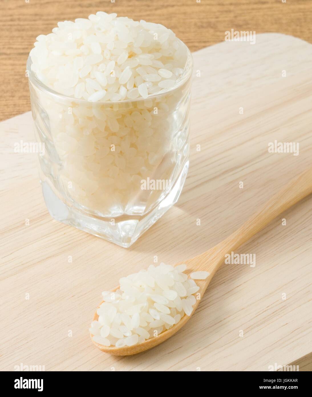 Japanese Cuisine, Raw and Uncooked Japanese Rice in A Wooden Spoon and ...