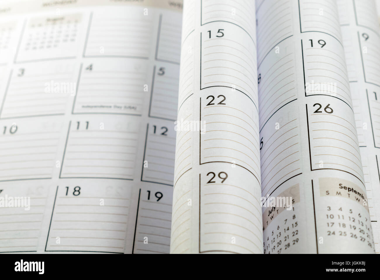Blurred and focused desk calendar Stock Photo - Alamy