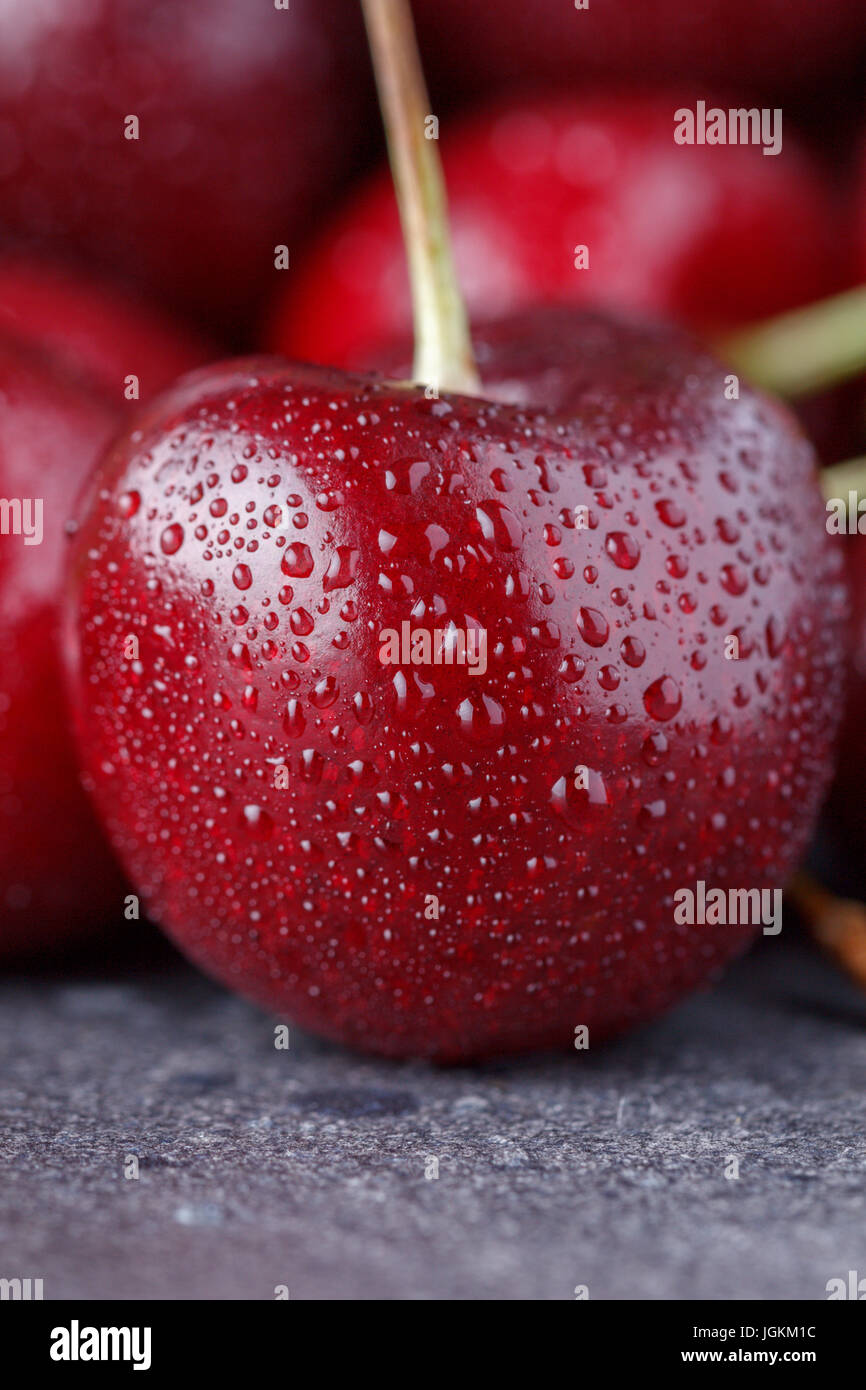 Juicy red cherry on a dark background. Fresh berries Stock Photo - Alamy