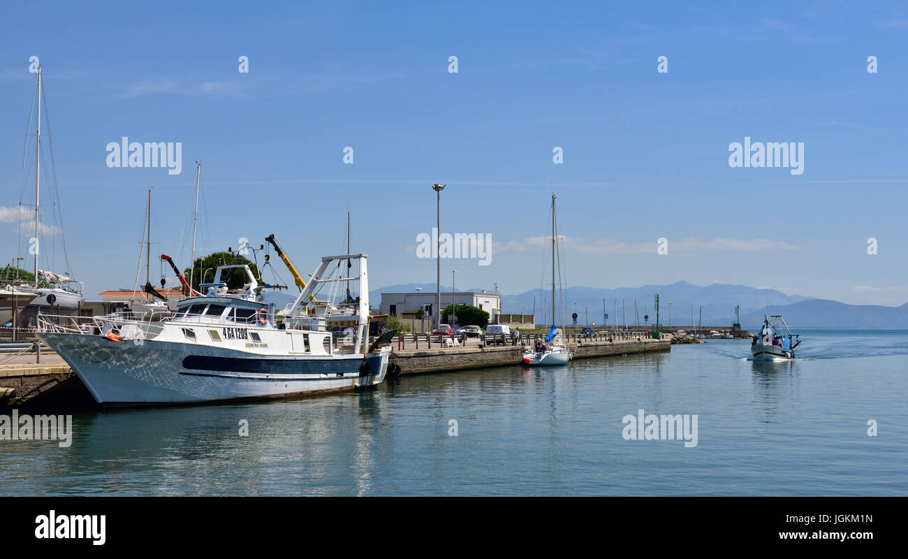 Port of Terracina, Italy, boat arriving in port Stock Photo - Alamy
