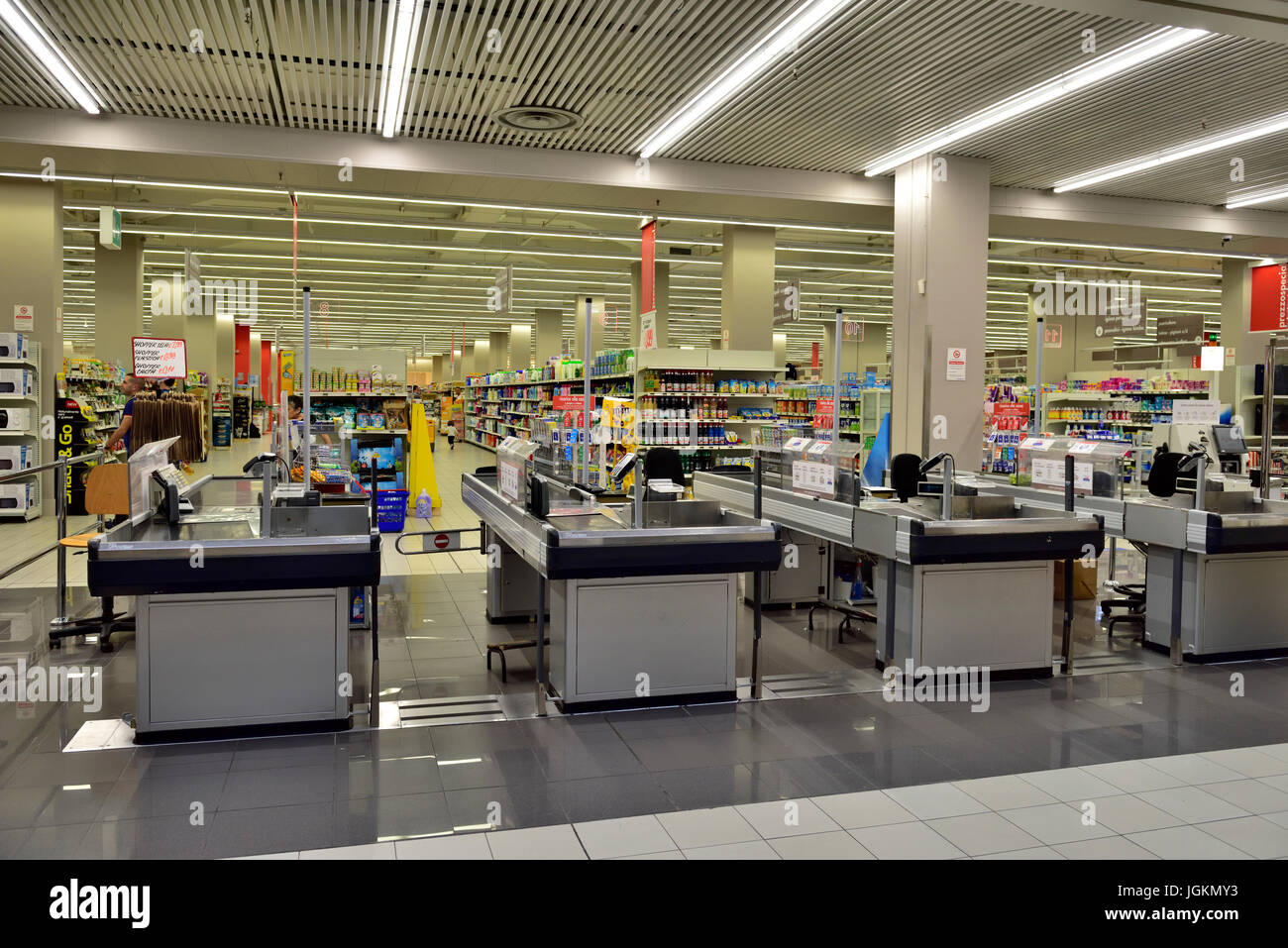 Inside large "Panorama store" Italian hypermarket with rows of check ...
