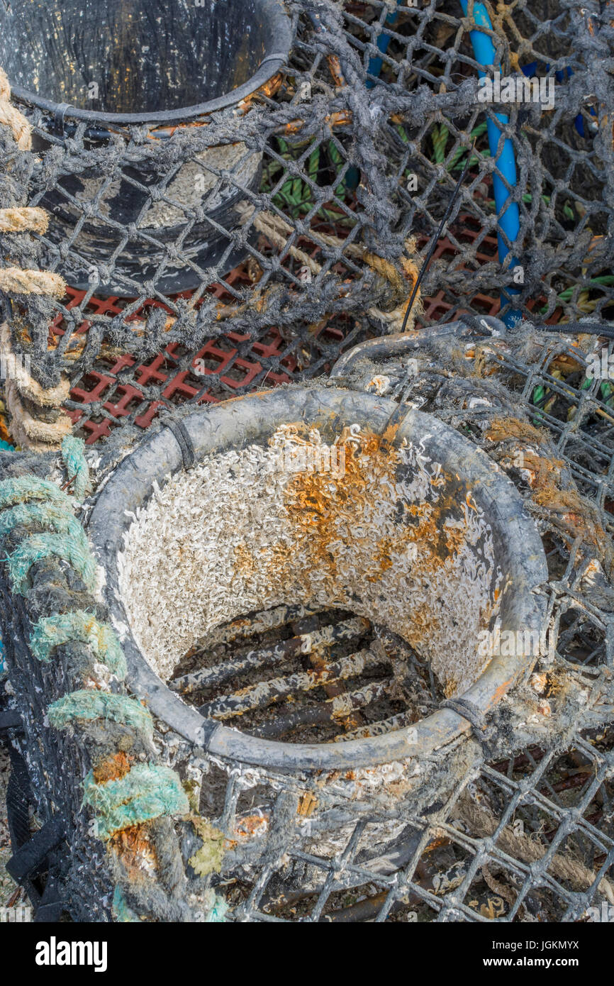 Lobster pot and fishing boat detail hi-res stock photography and images ...